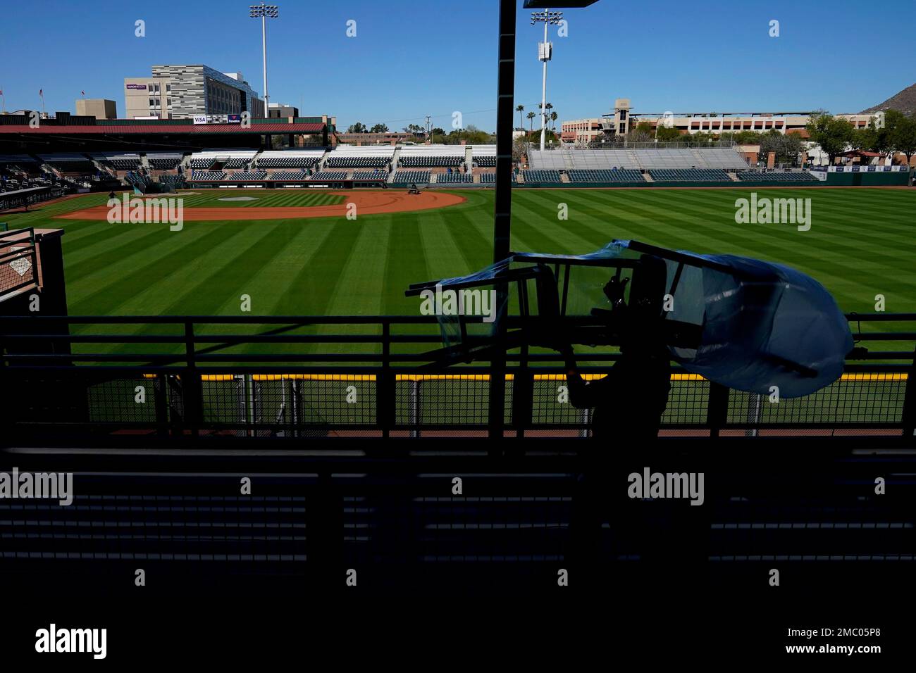 San Francisco Giants' grounds keepers prepare the field at Scottsdale ...