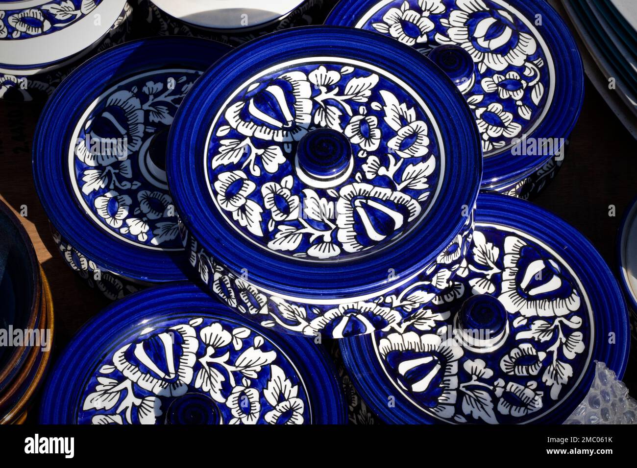 A top view of blue pots with closures in Asian style, handmade ceramics ...