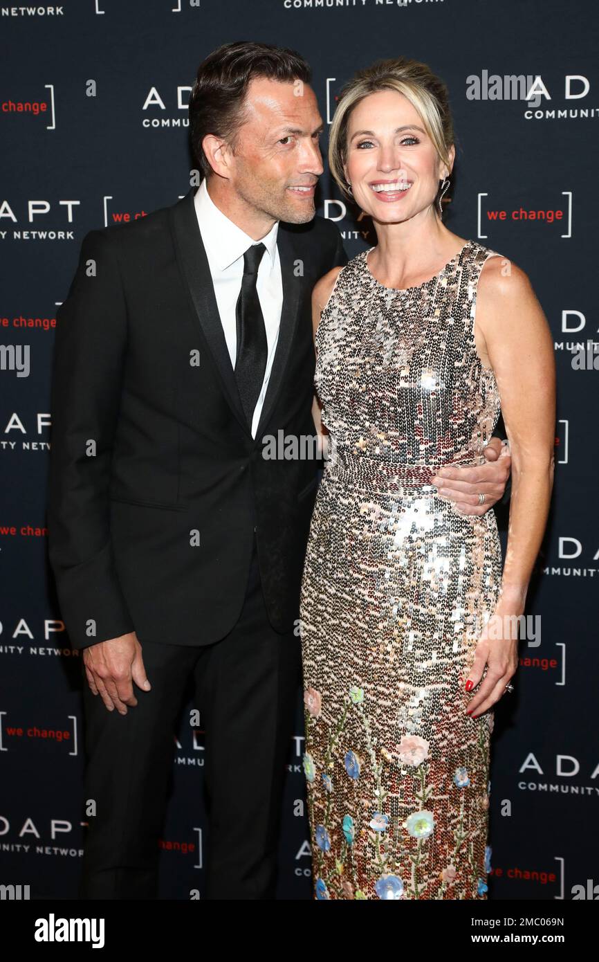 Actor Andrew Shue, left, and his wife, television journalist Amy Robach ...