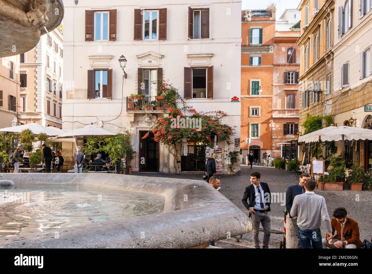 Scene with young people at Piazza della Madonna dei Monti, Rome Stock ...