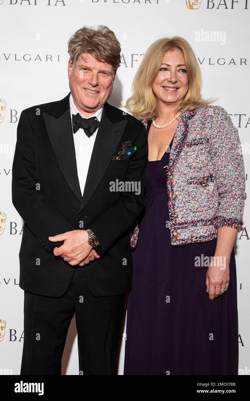 Robert Wade and Sue Denham-Wade pose for photographers upon arrival at ...