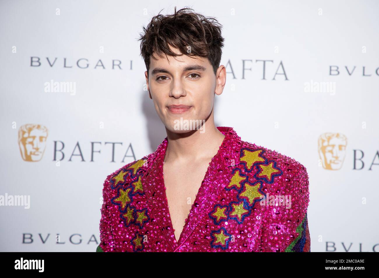 Max Harwood poses for photographers upon arrival at the BAFTA Gala ...