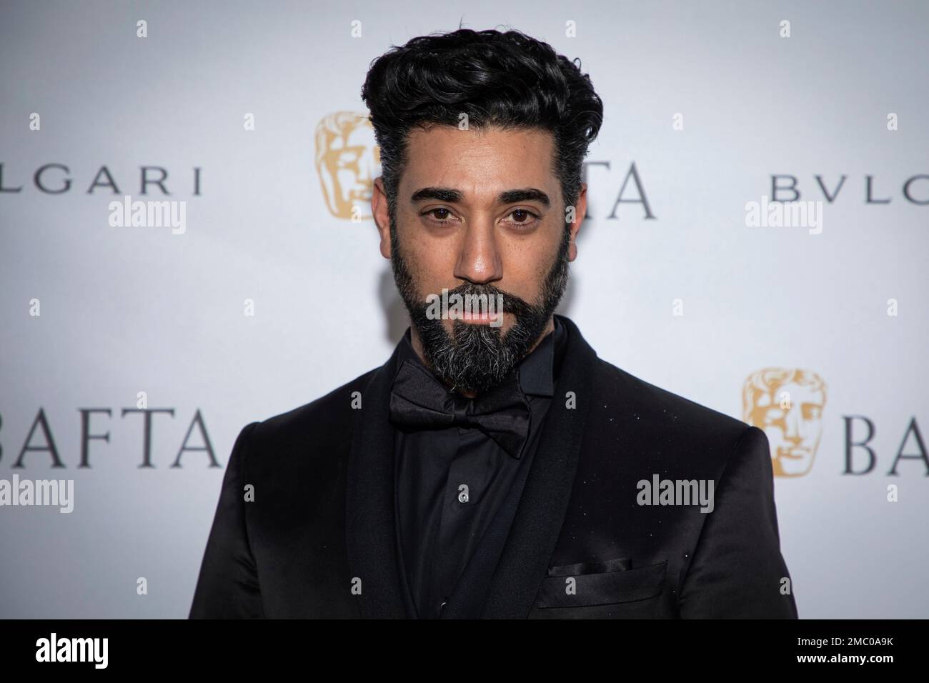 Ray Panthaki poses for photographers upon arrival at the BAFTA Gala ...