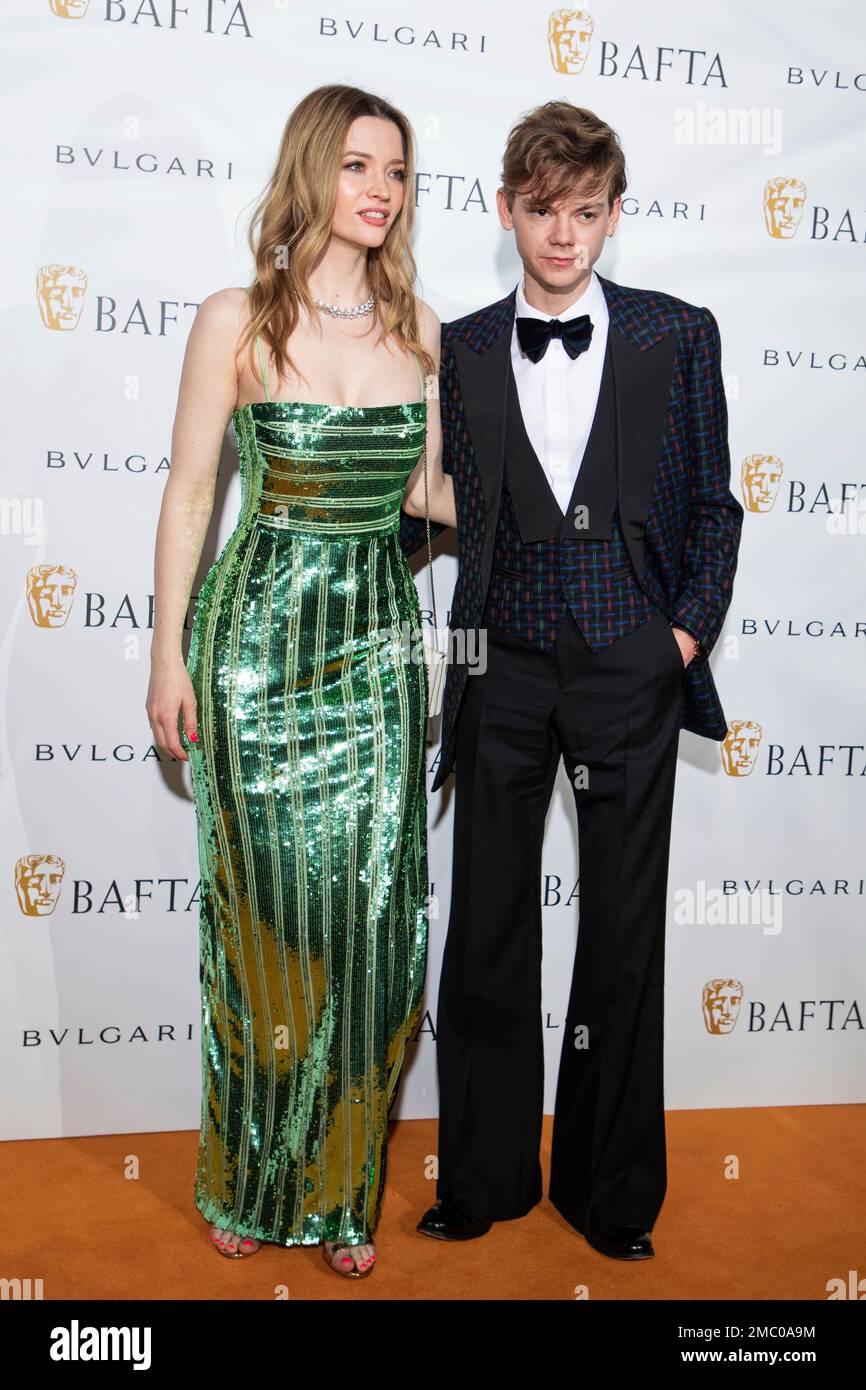 Talulah Riley, right, and Thomas Brodie-Sangster pose for photographers ...