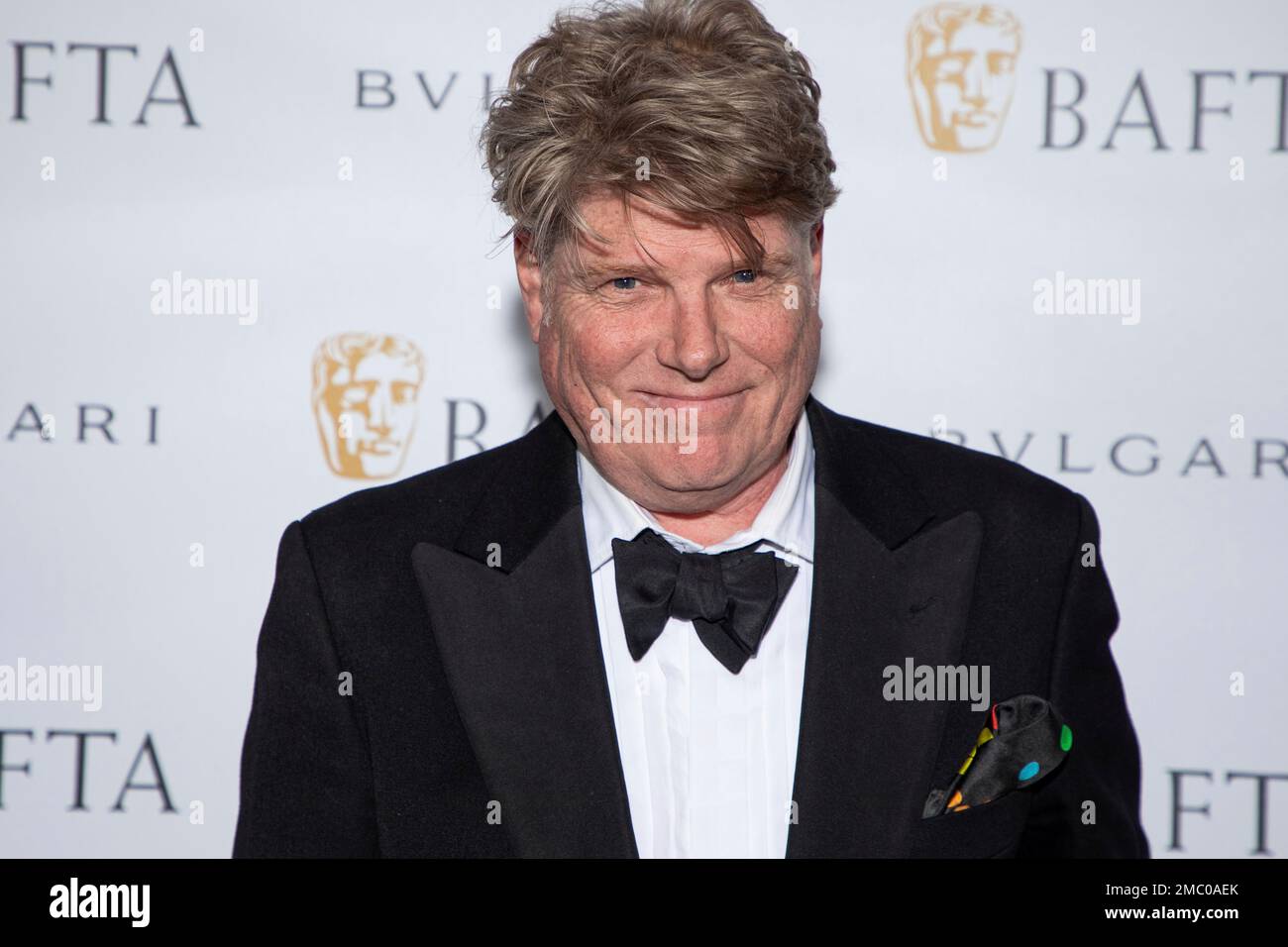 Robert Wade poses for photographers upon arrival at the BAFTA Gala ...