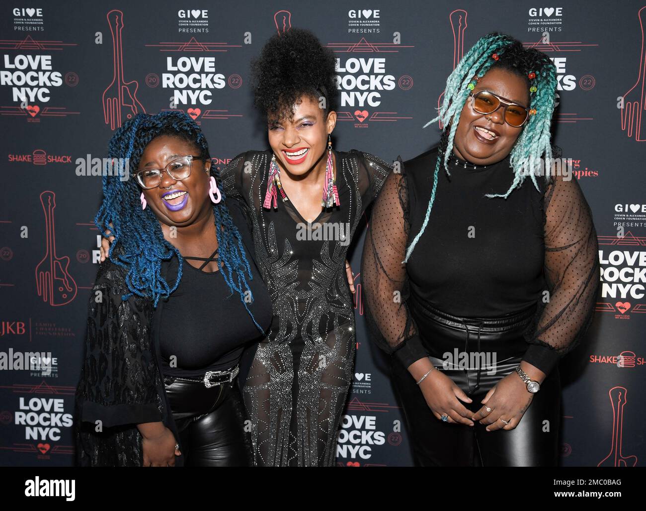 Singer Allison Russell, center, poses with Chauntee Ross, left, and ...