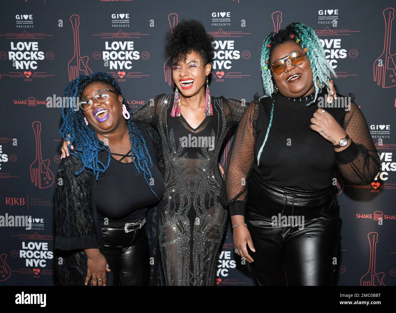 Singer Allison Russell, center, poses with Chauntee Ross, left, and ...