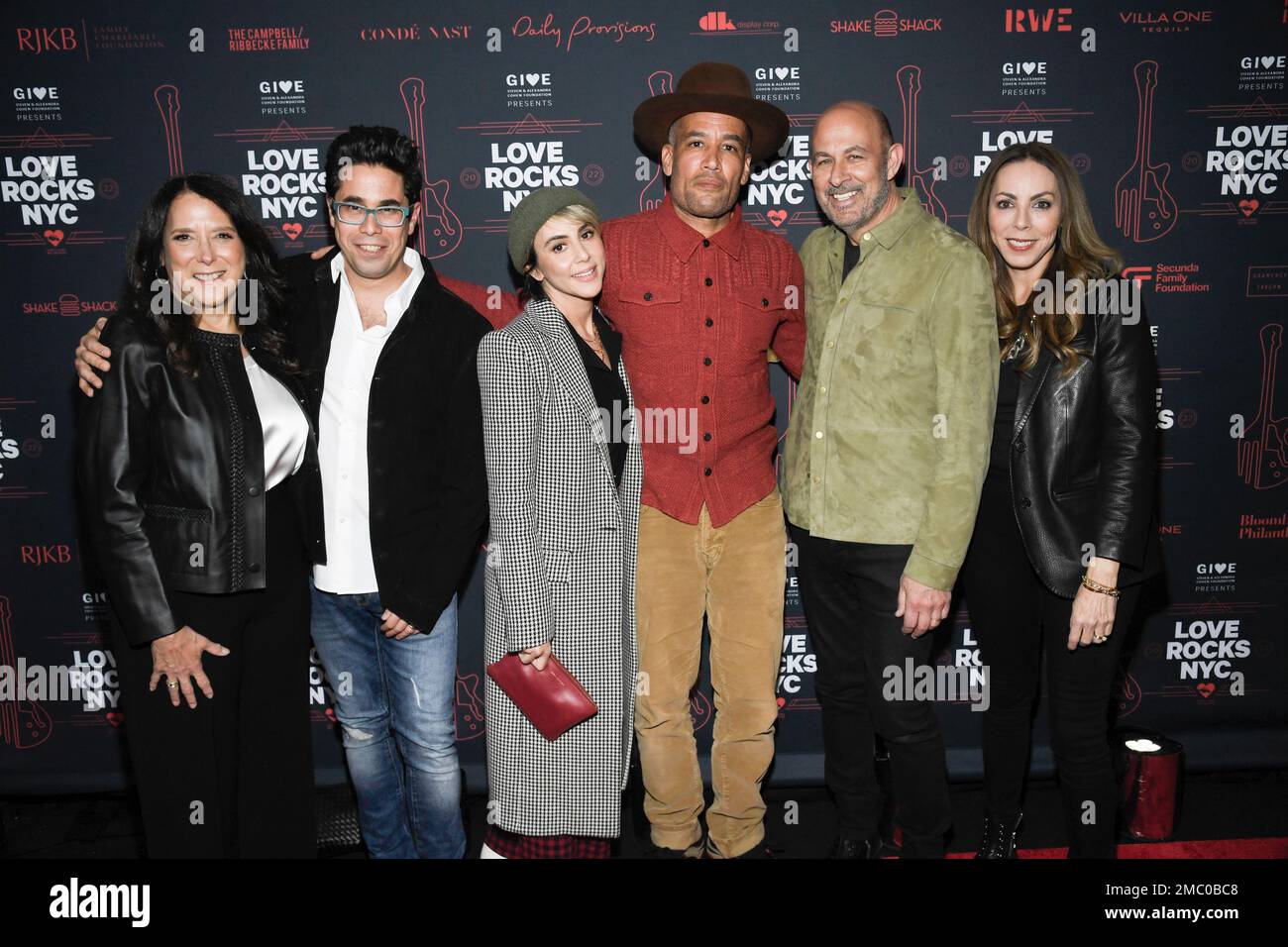 Musician Ben Harper and wife Jaclyn Matfus, center, pose with God's ...