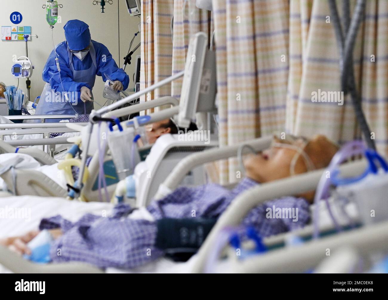 Beijing, China. 21st Jan, 2023. A nursing worker takes care of a ...