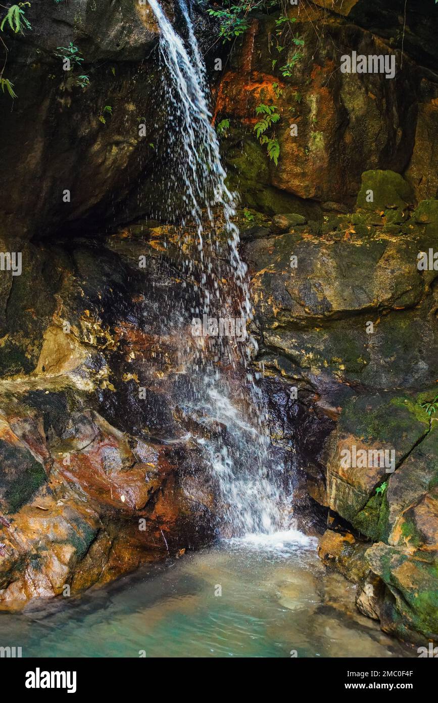 Small waterfall, with green pool under in Isalo park, Madagascar Stock ...