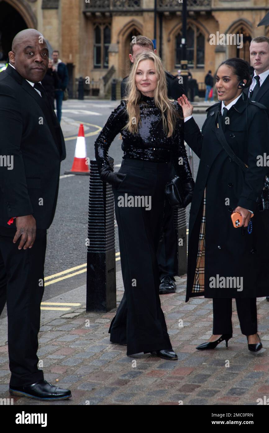Kate Moss poses for photographers upon arrival at the Burberry fashion ...