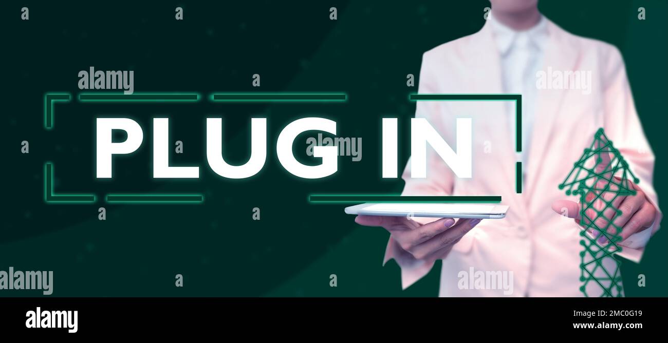 Writing displaying text Plug In. Conceptual photo putting device into ...