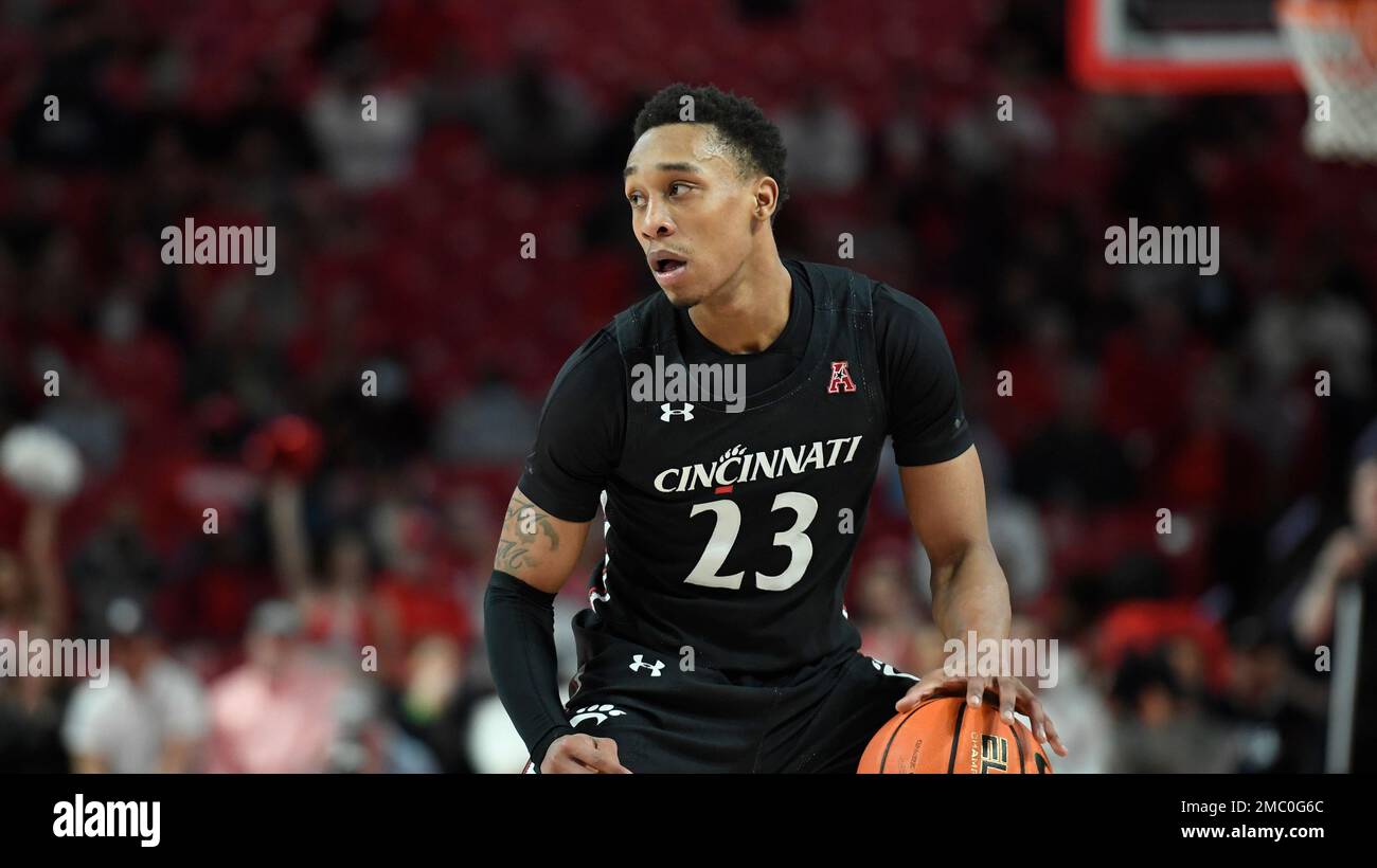 Cincinnati guard Mika Adams-Woods (23) controls the ball against ...