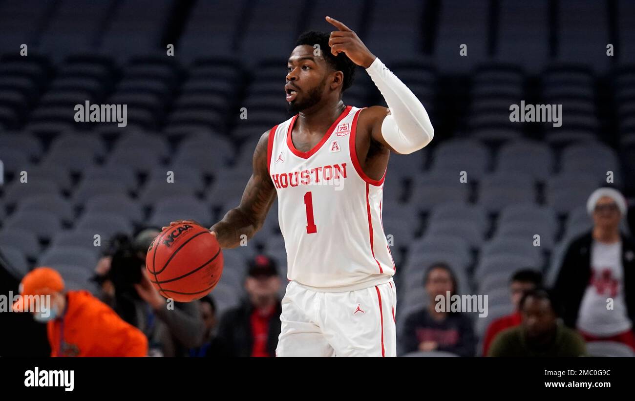 Houston guard Jamal Shead instructs the offense during an NCAA college ...