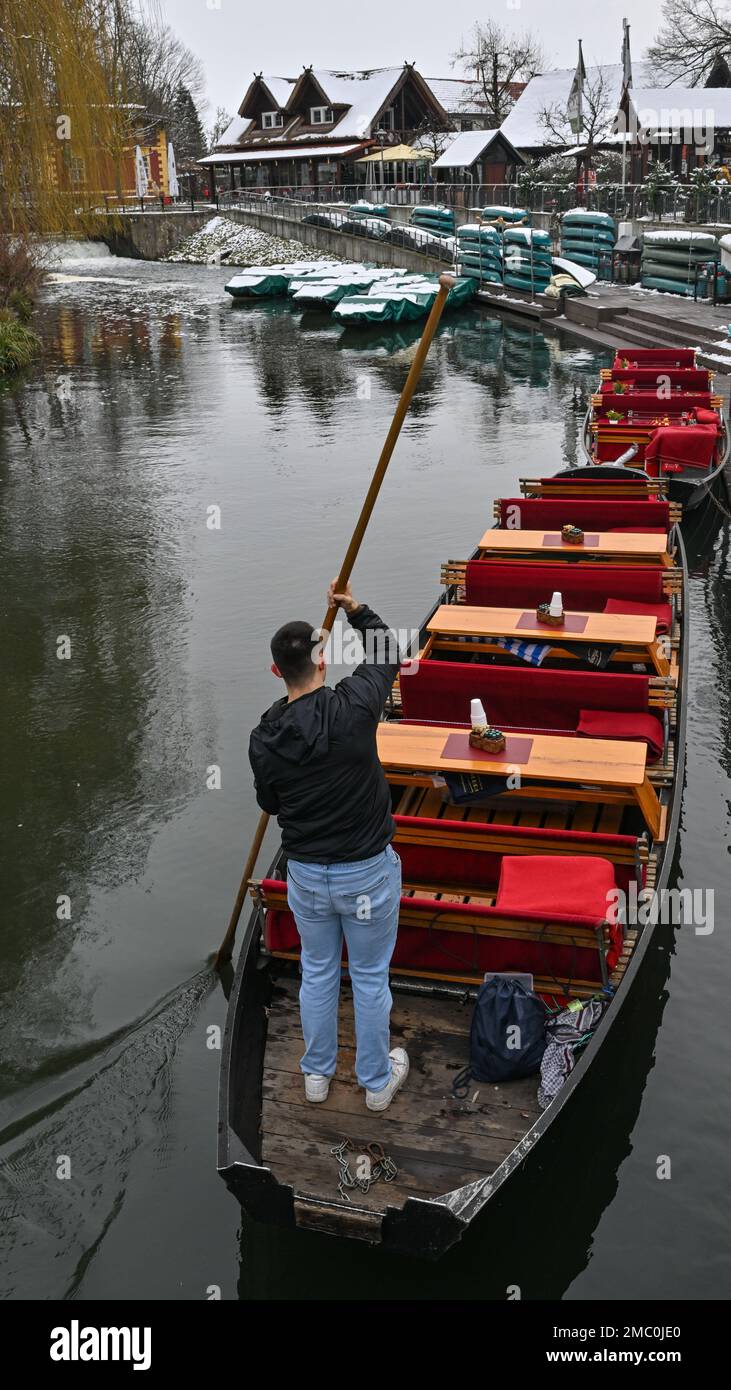 Burg, Germany. 21st Jan, 2023. A ferryman comes with his barge to the ...