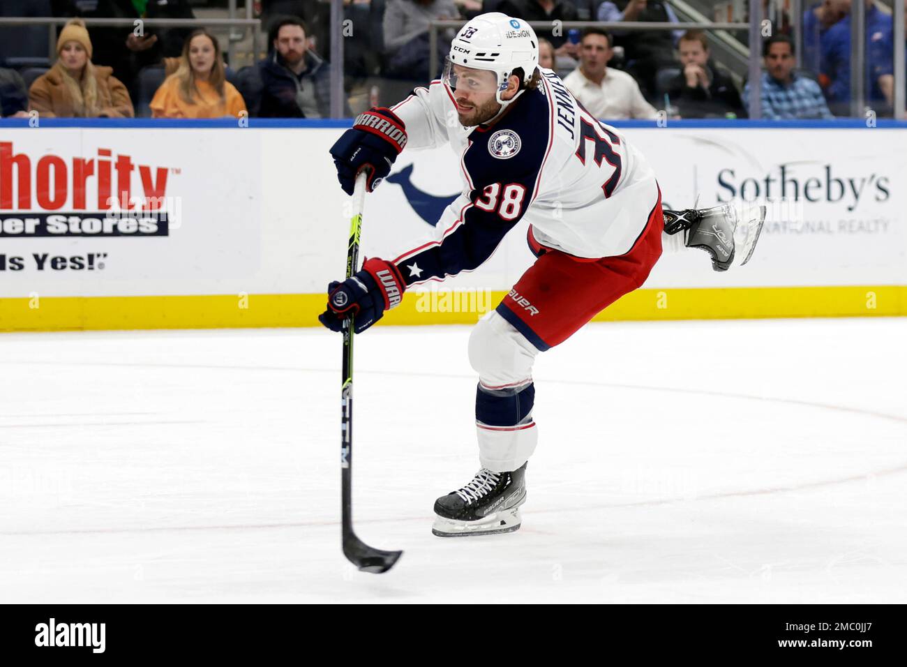 Columbus Blue Jackets center Boone Jenner (38) shoots against the New ...