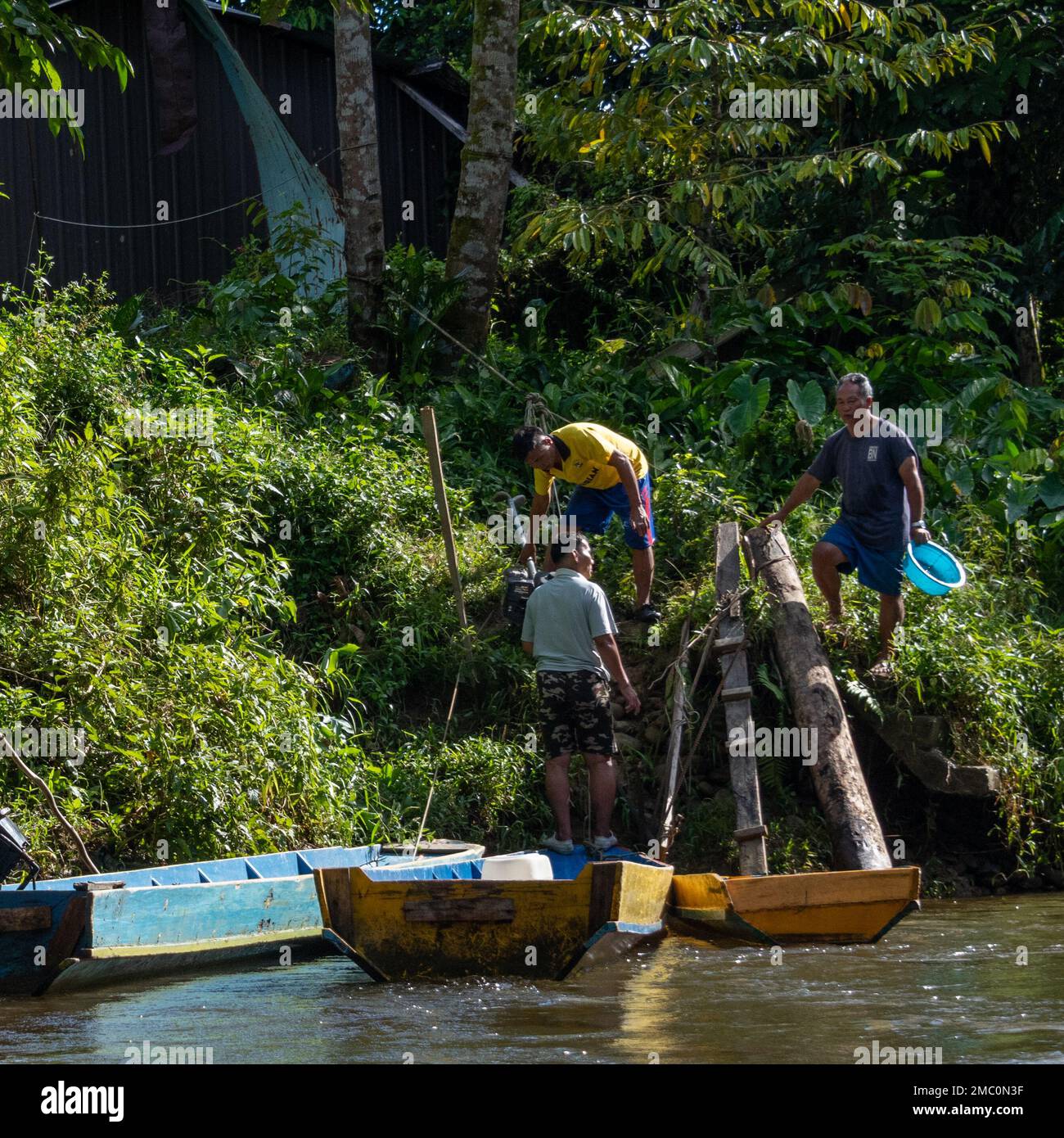 People Working along River, Mulu Village, Borneo Stock Photo - Alamy