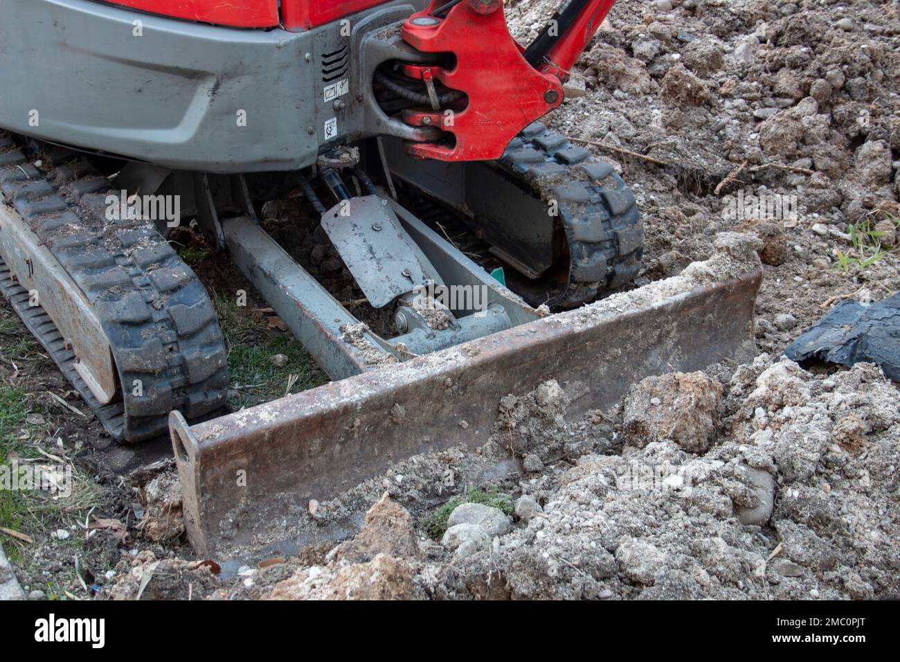 Backhoe city street hi-res stock photography and images - Alamy