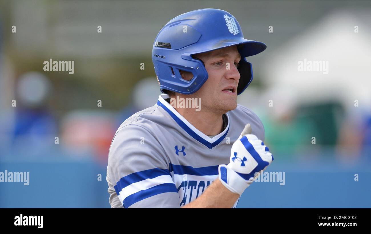 Zack Sylvester (4) sprints to first during an NCAA baseball game on ...