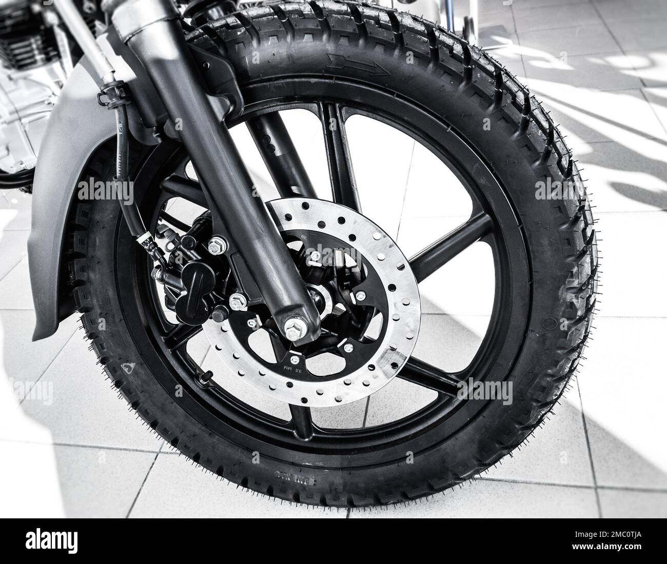 front wheel of brand new motorcycle Stock Photo - Alamy