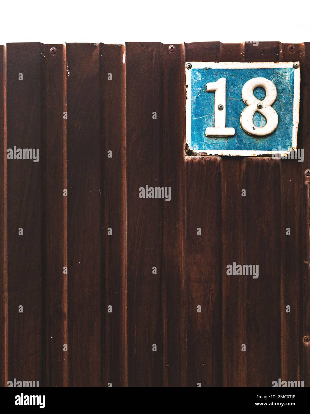 old address number plate on the profiled fence Stock Photo - Alamy