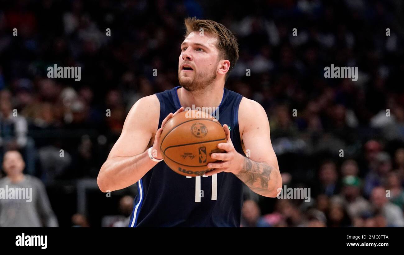 Dallas Mavericks guard Luka Doncic prepares to take a shot during an ...