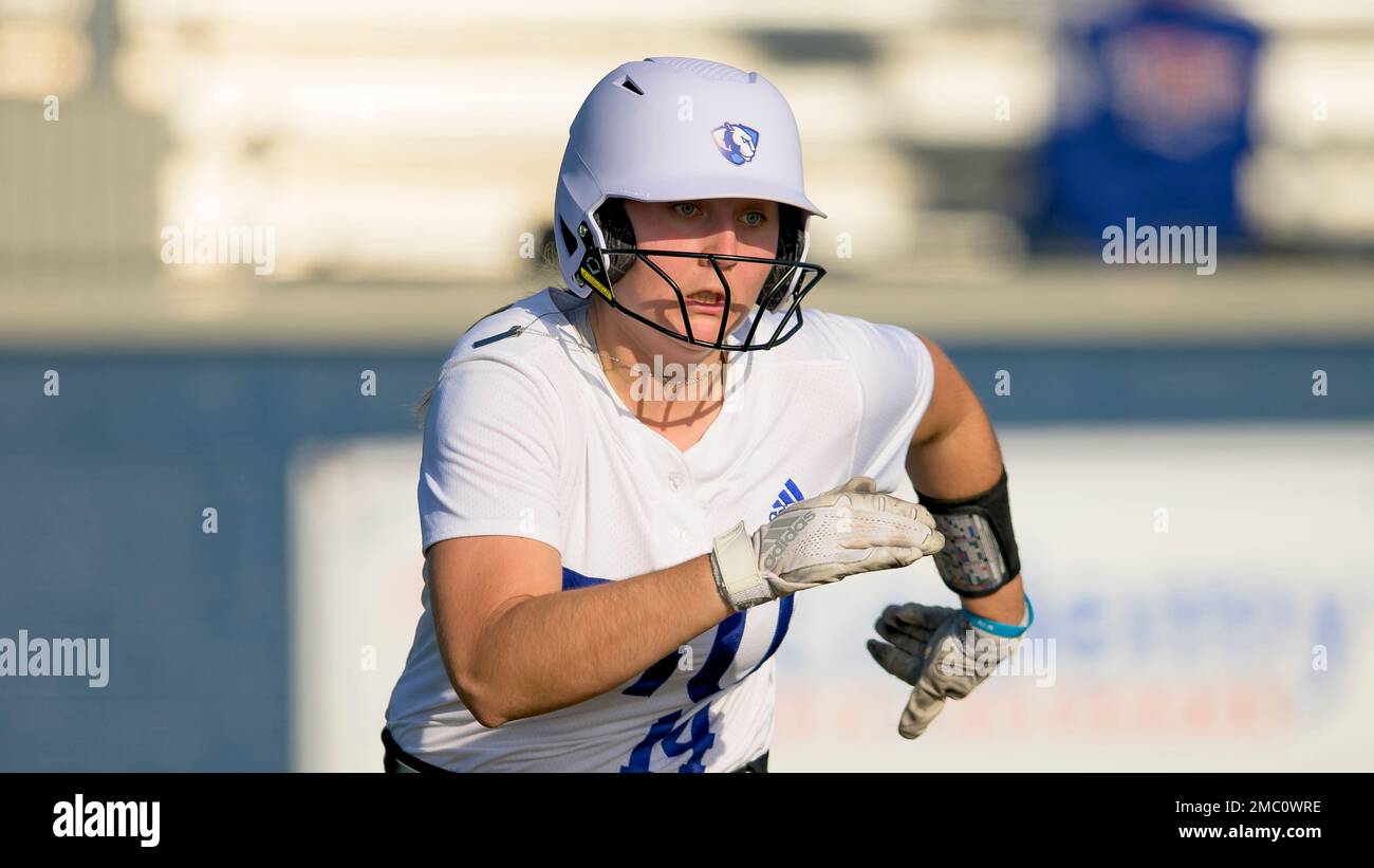 Eastern Illinois catcher Lindy Milkowski (14) runs during an NCAA ...