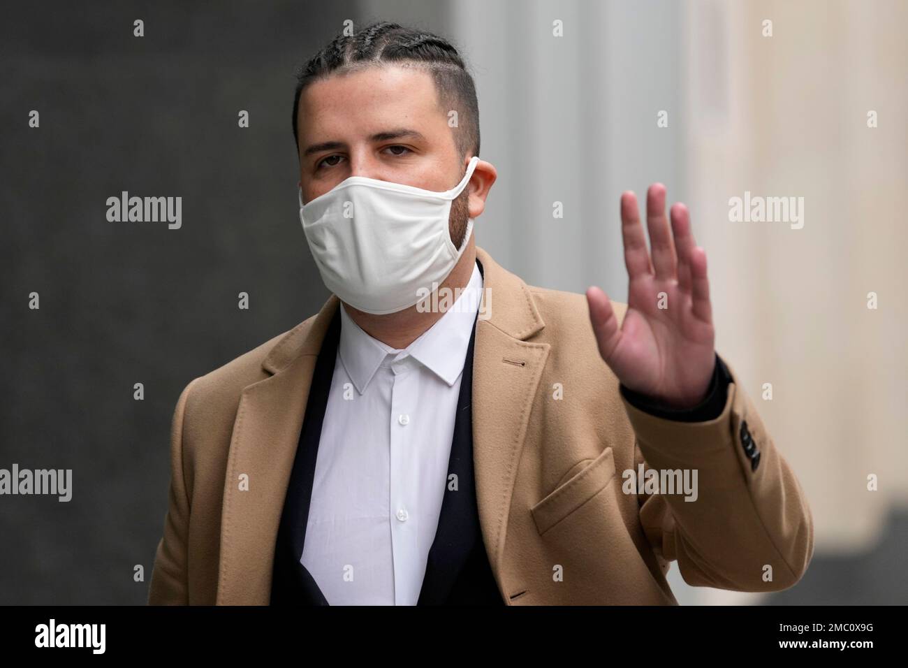 Artist Sami Chokri arrives at the high Court in London, Thursday, March ...