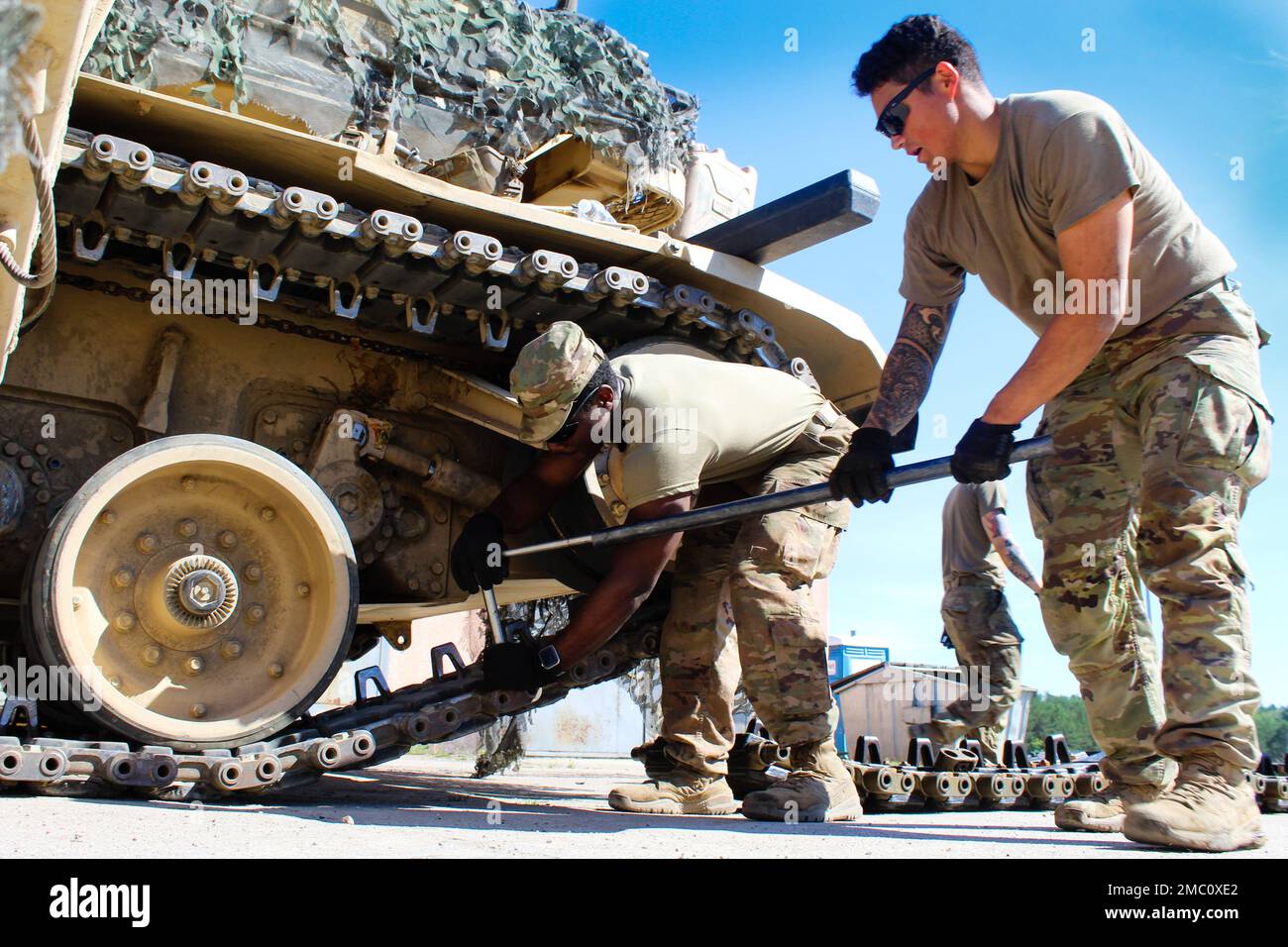 U.S. Army Sgt. ChriShon Powell and Sgt. Jesse Brown, both assigned to ...