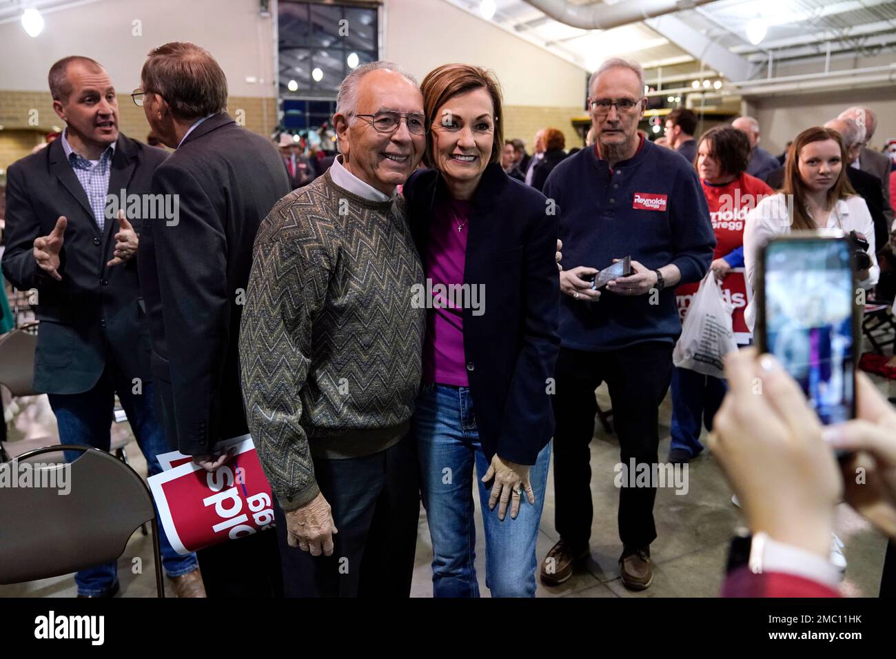 Iowa Gov. Kim Reynolds poses for a photo with her father Charles Strawn ...