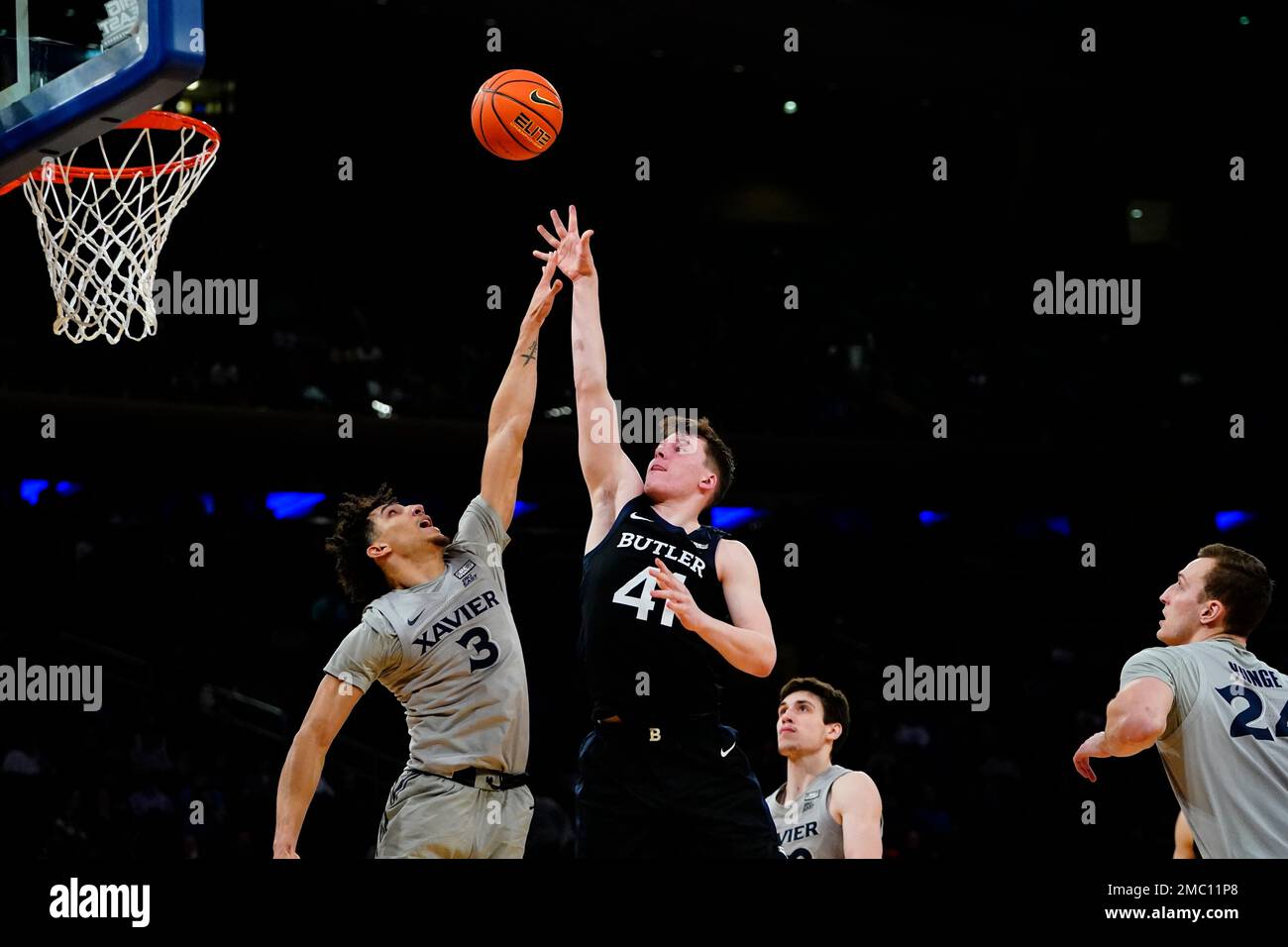 Butler's Simas Lukosius (41) shoots over Xavier's Colby Jones (3 ...