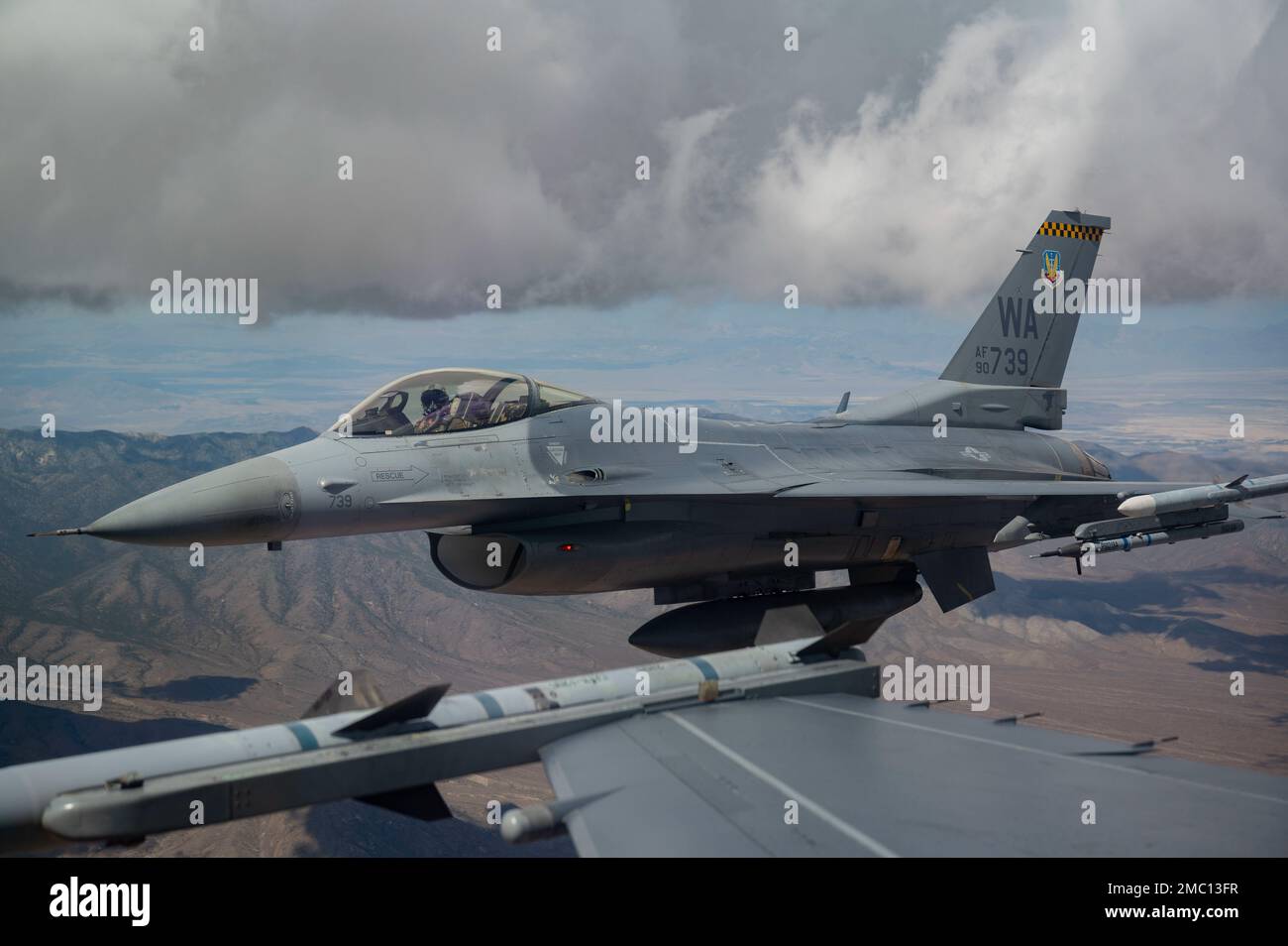 Capt. Cameron Wall, F-16 pilot assigned to the 64th Aggressor Squadron ...