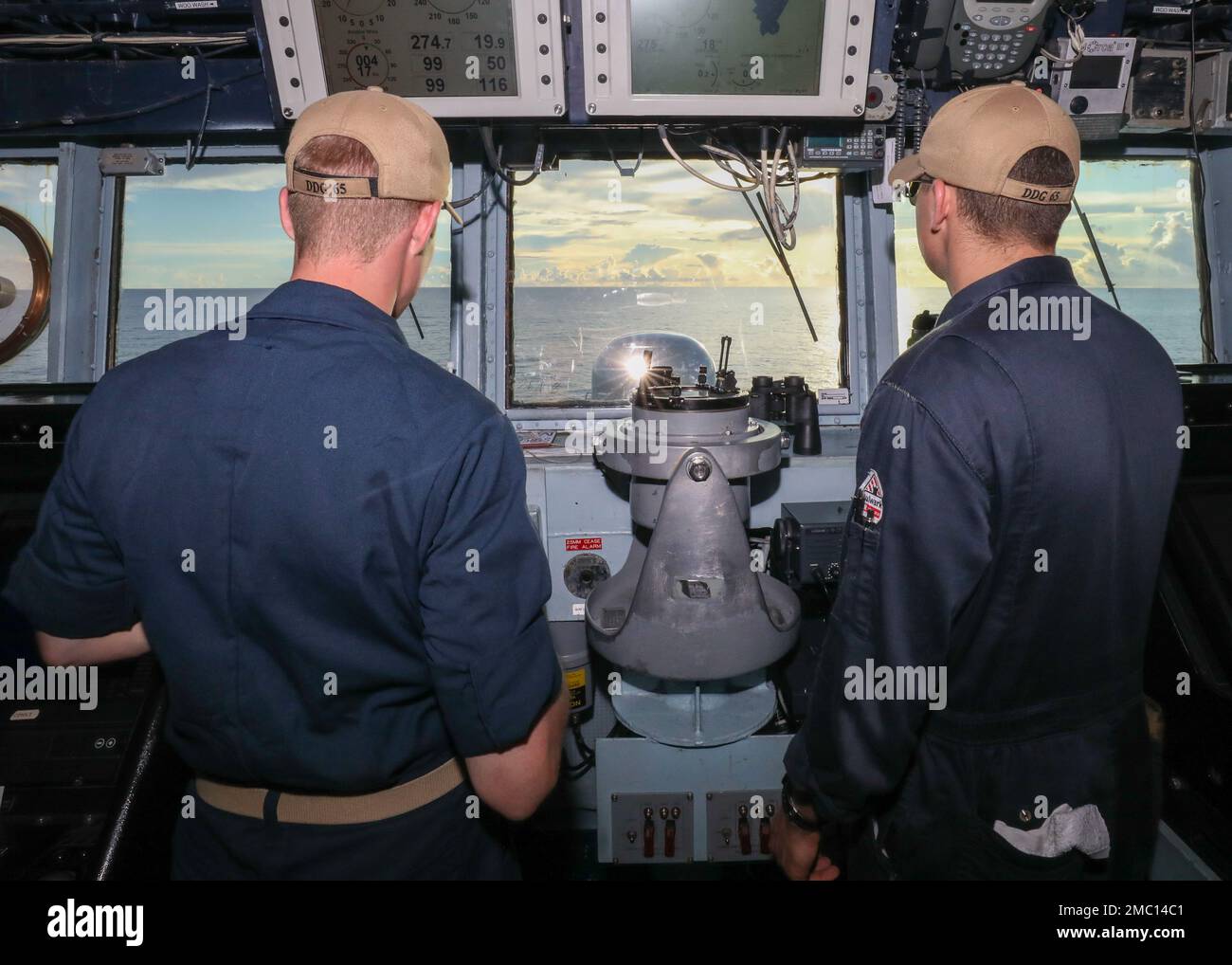 PHILIPPINE SEA (June 23, 2022) Ensign Christopher Rielage, left, from ...