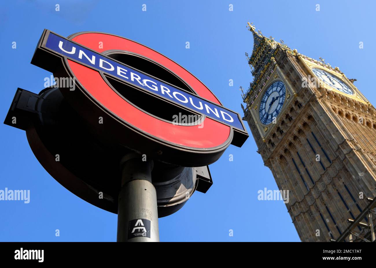 Underground sign, Big Ben in the background, Westminster, London ...