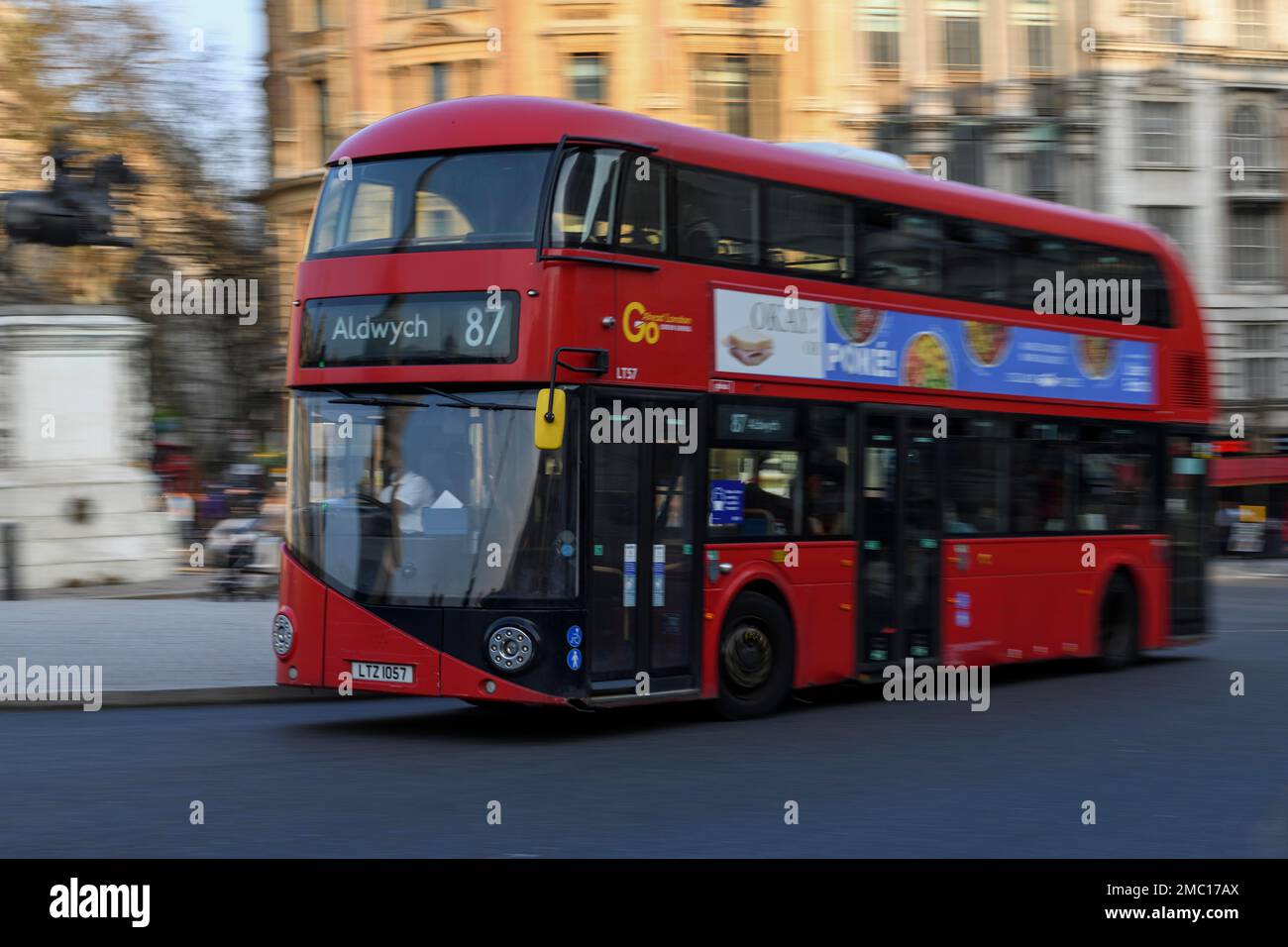 Red double-decker bus in Trafalgar Square, Westminster, London, England ...