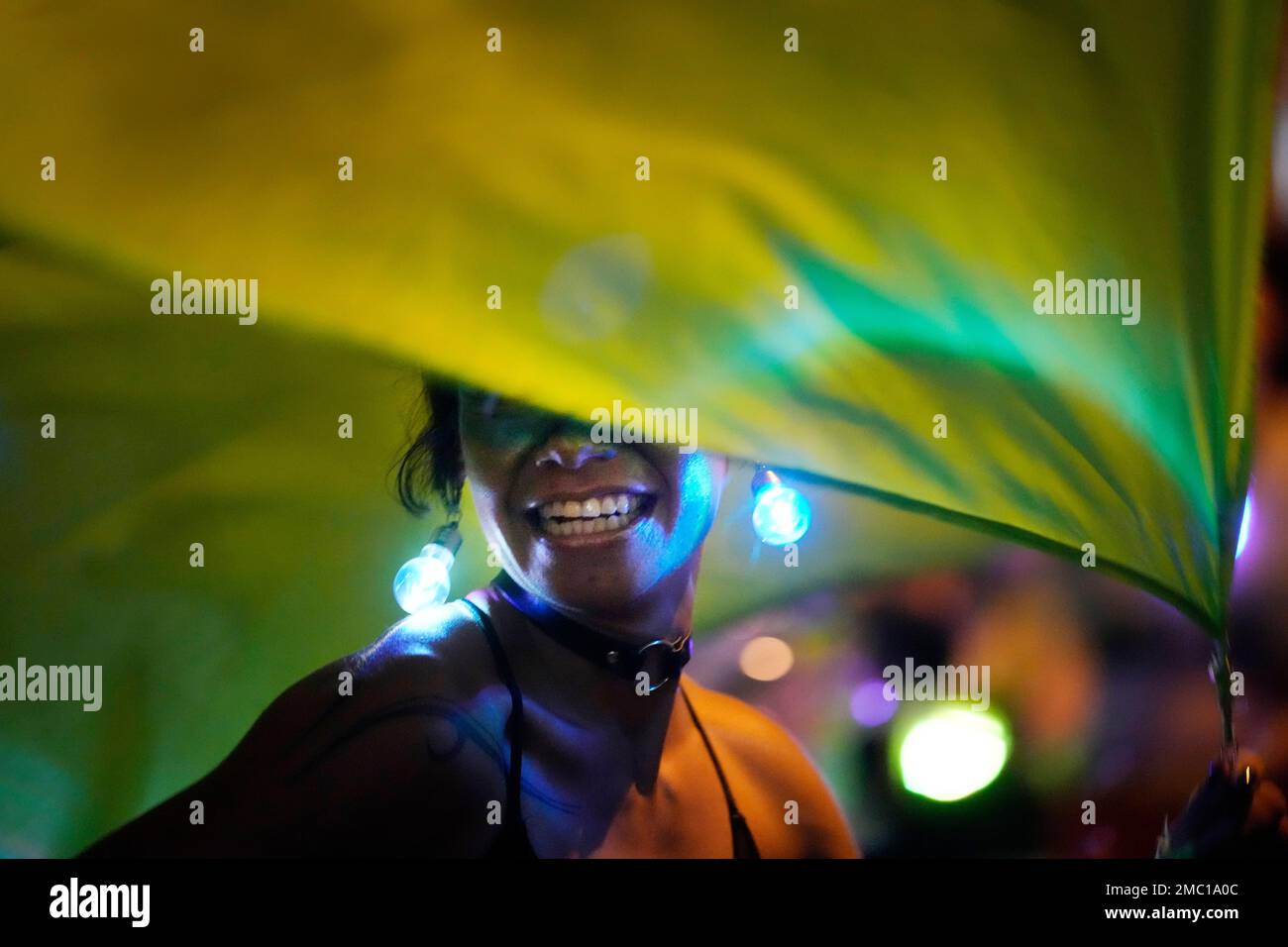 Woman perform with flags during protest to commemorate International ...
