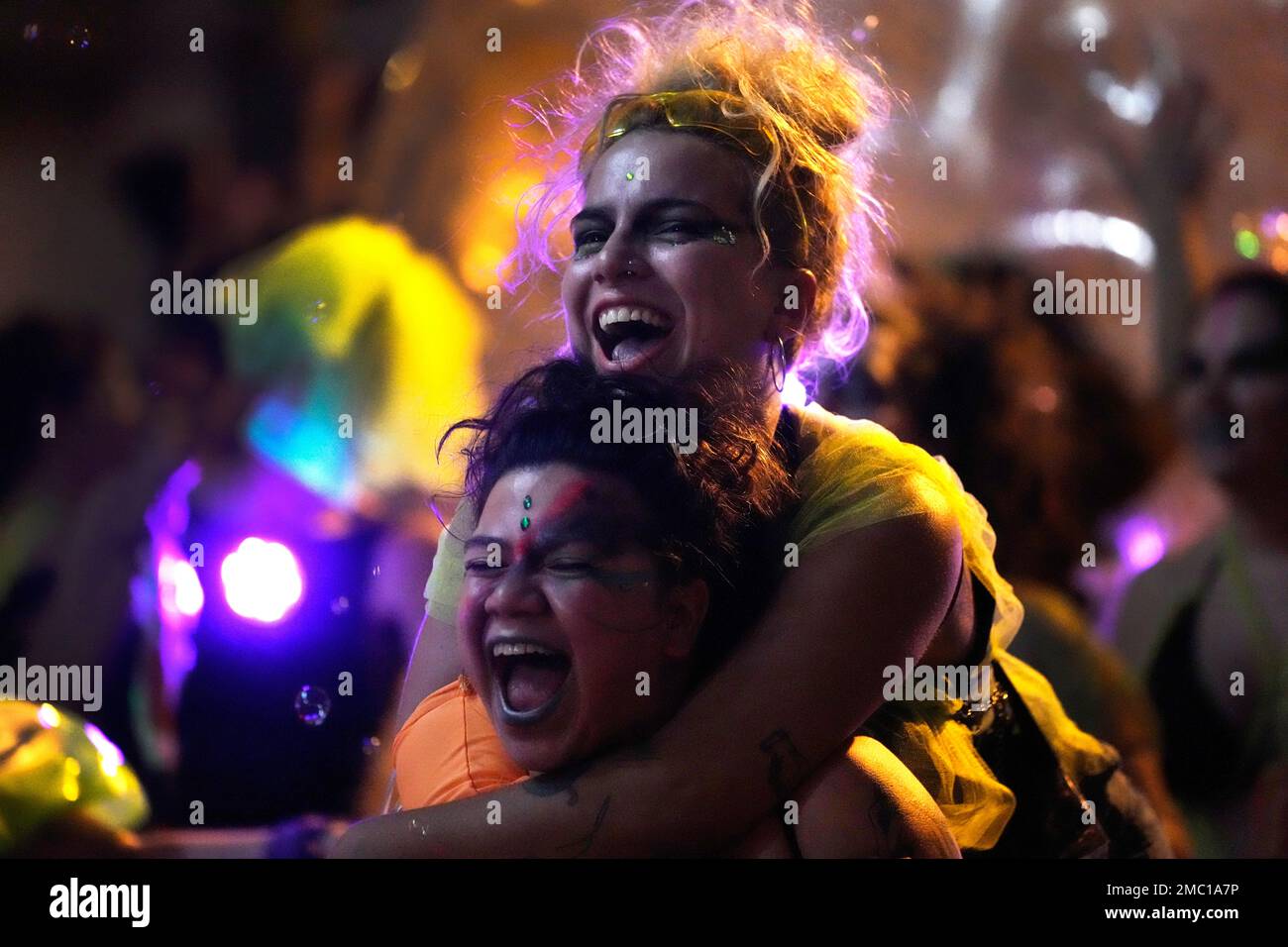 Women laugh during a march to commemorate International Women´s Day in ...