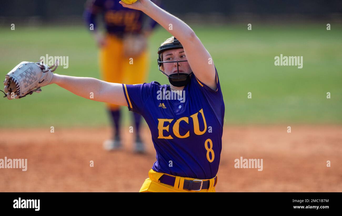 East Carolina's Jordan Hatch (8) pitches during an NCAA softball game ...