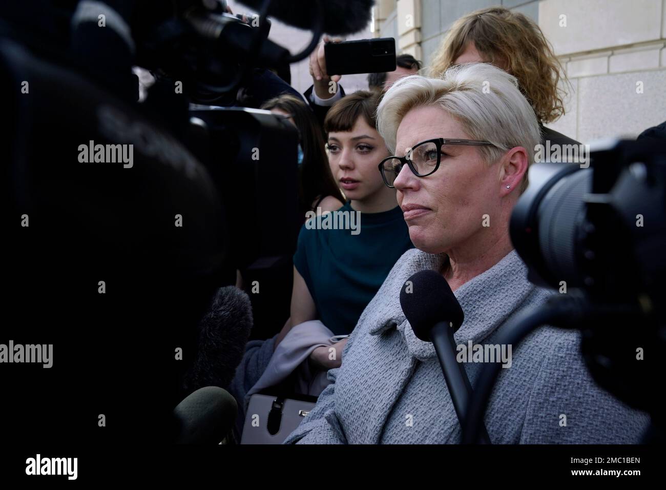 Nicole Reffitt talks to reporters outside of federal court in ...