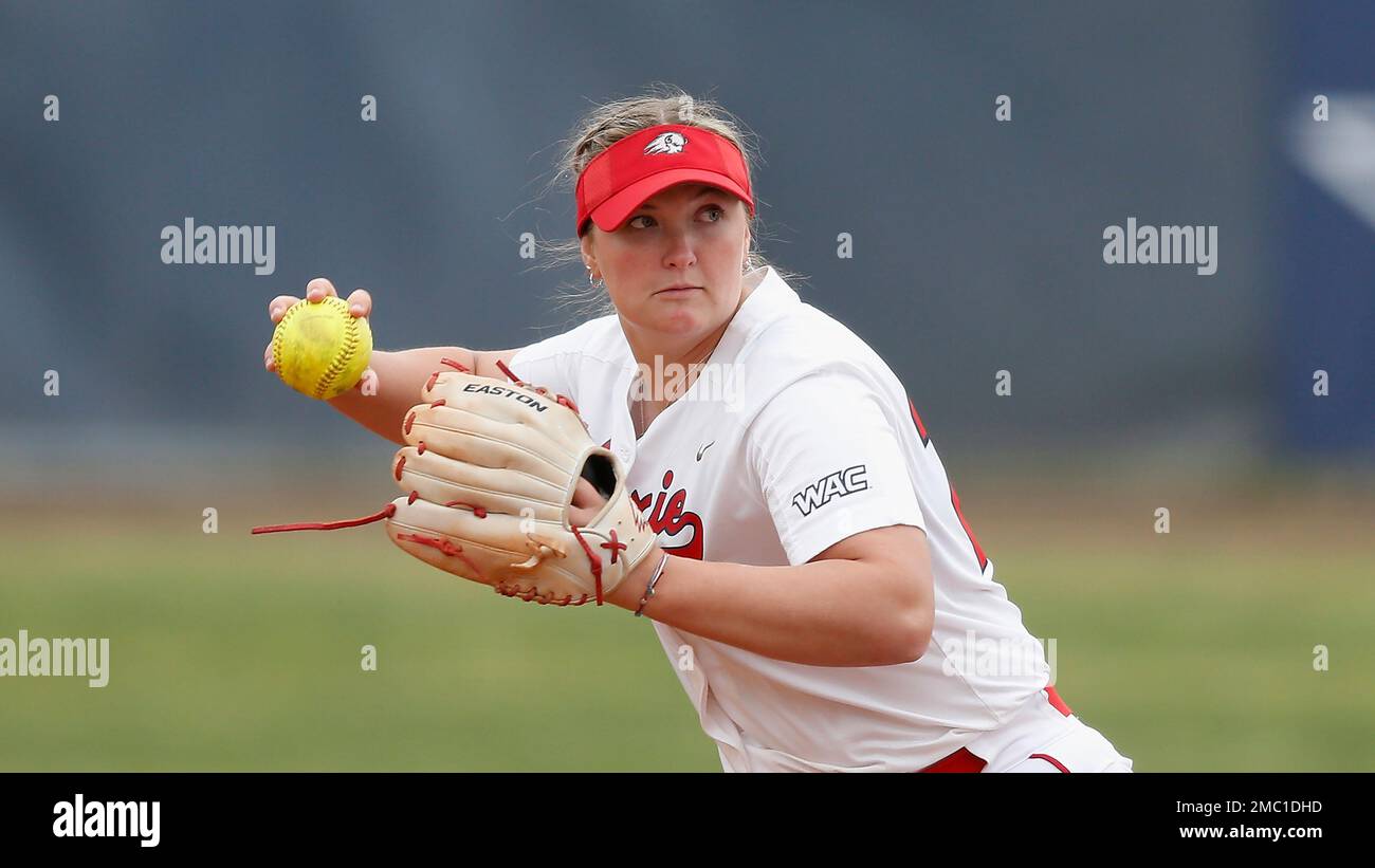 Laura Lockard of Dixie State fields the ball against UC Davis during an ...