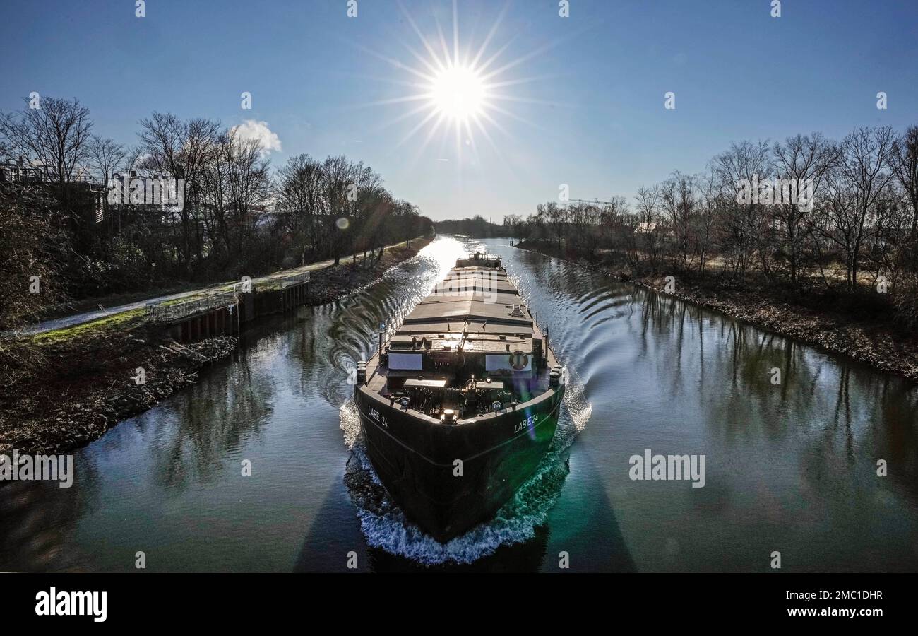 A freight ship is operating on a canal at a sunny Tuesday, March 8 ...