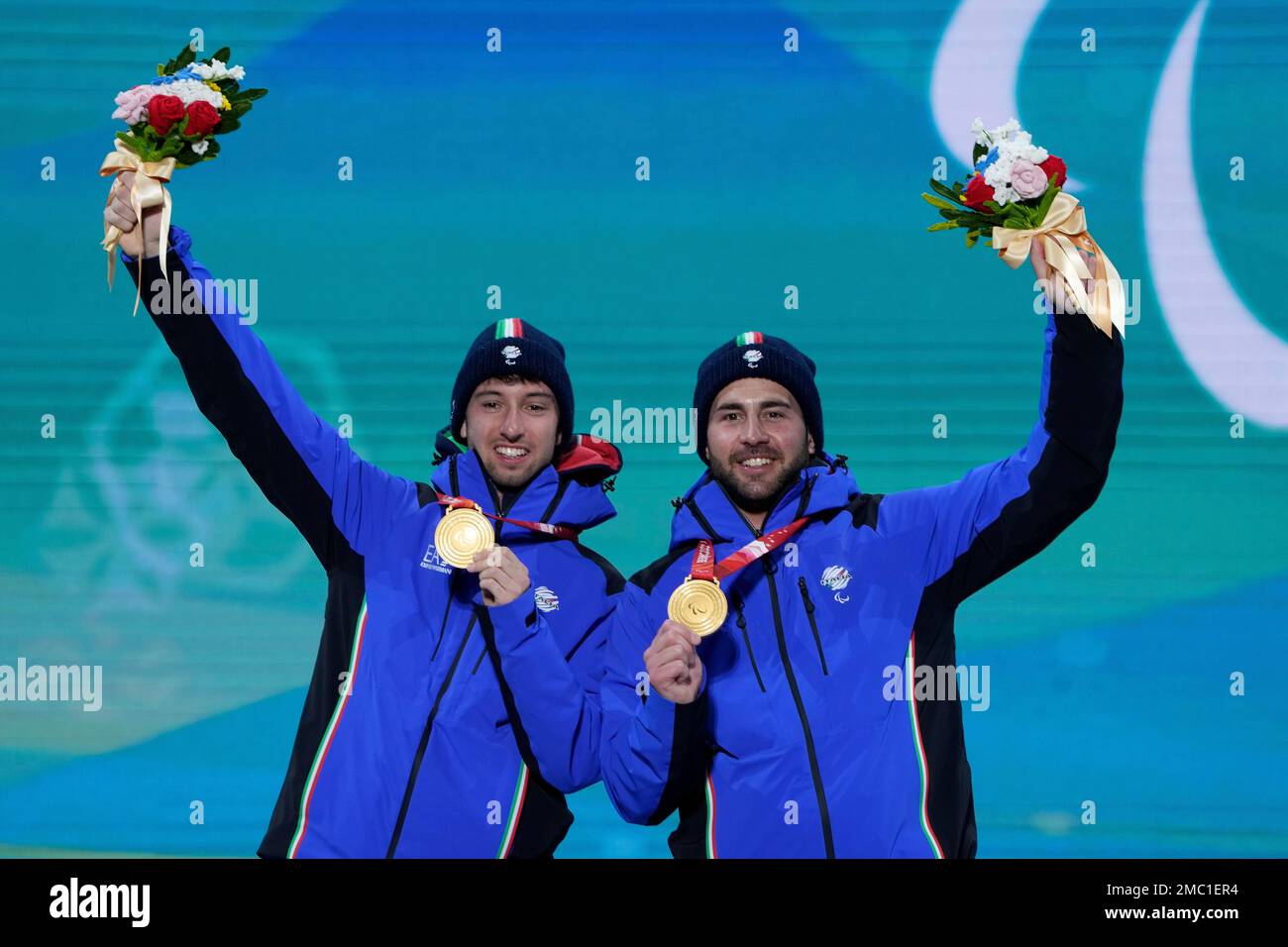 Gold medalist Giacomo Bertagnolli of Italy and guide Andrea Ravelli ...