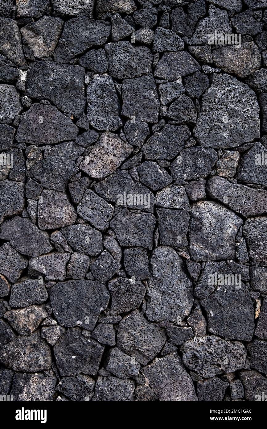 Dark volcanic stone facade hi-res stock photography and images - Alamy