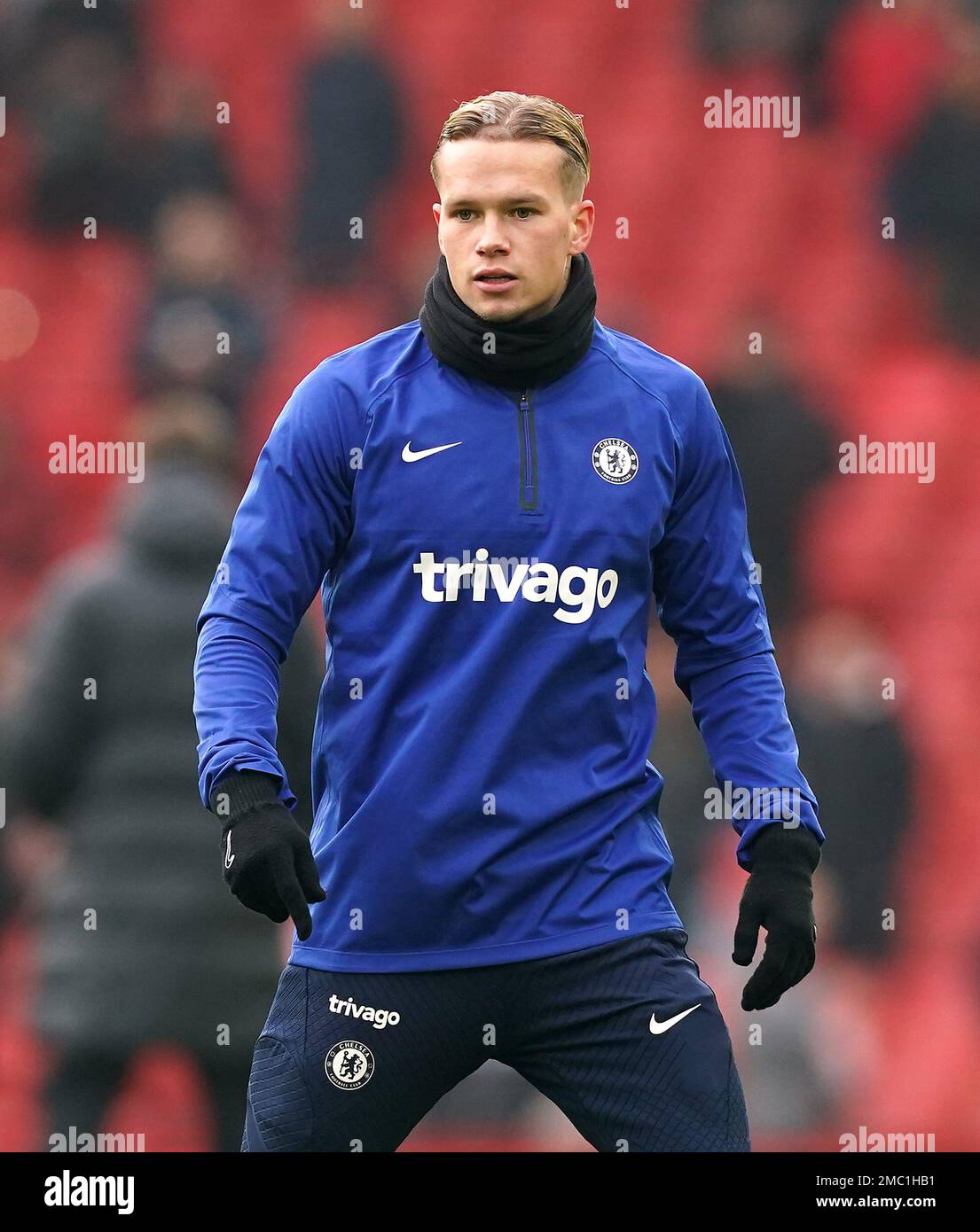 Chelsea’s Mykhailo Mudryk warms up on the pitch before the Premier ...