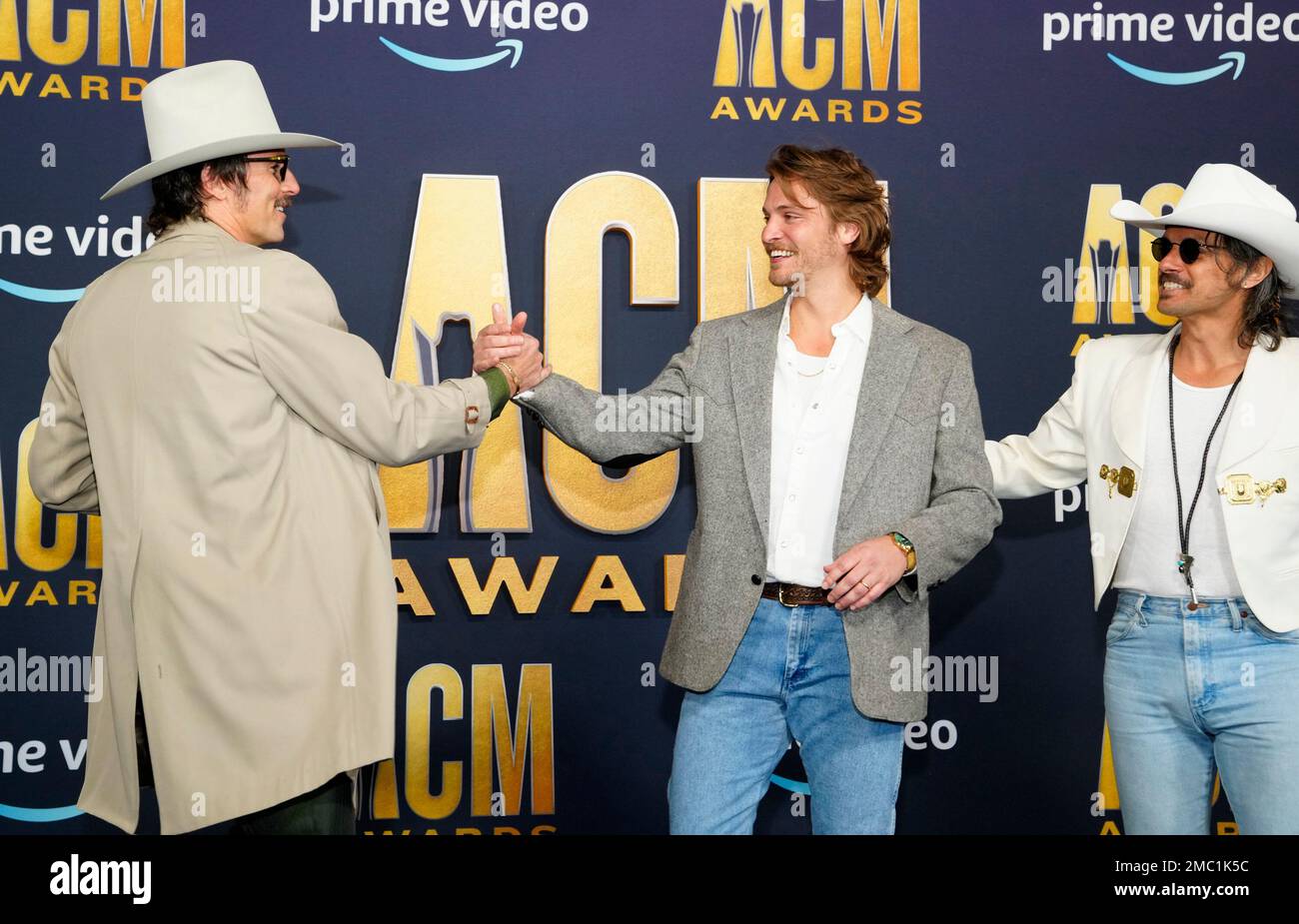 Mark Wystrach, left, and Cameron Duddy, right, of Midland pose with ...