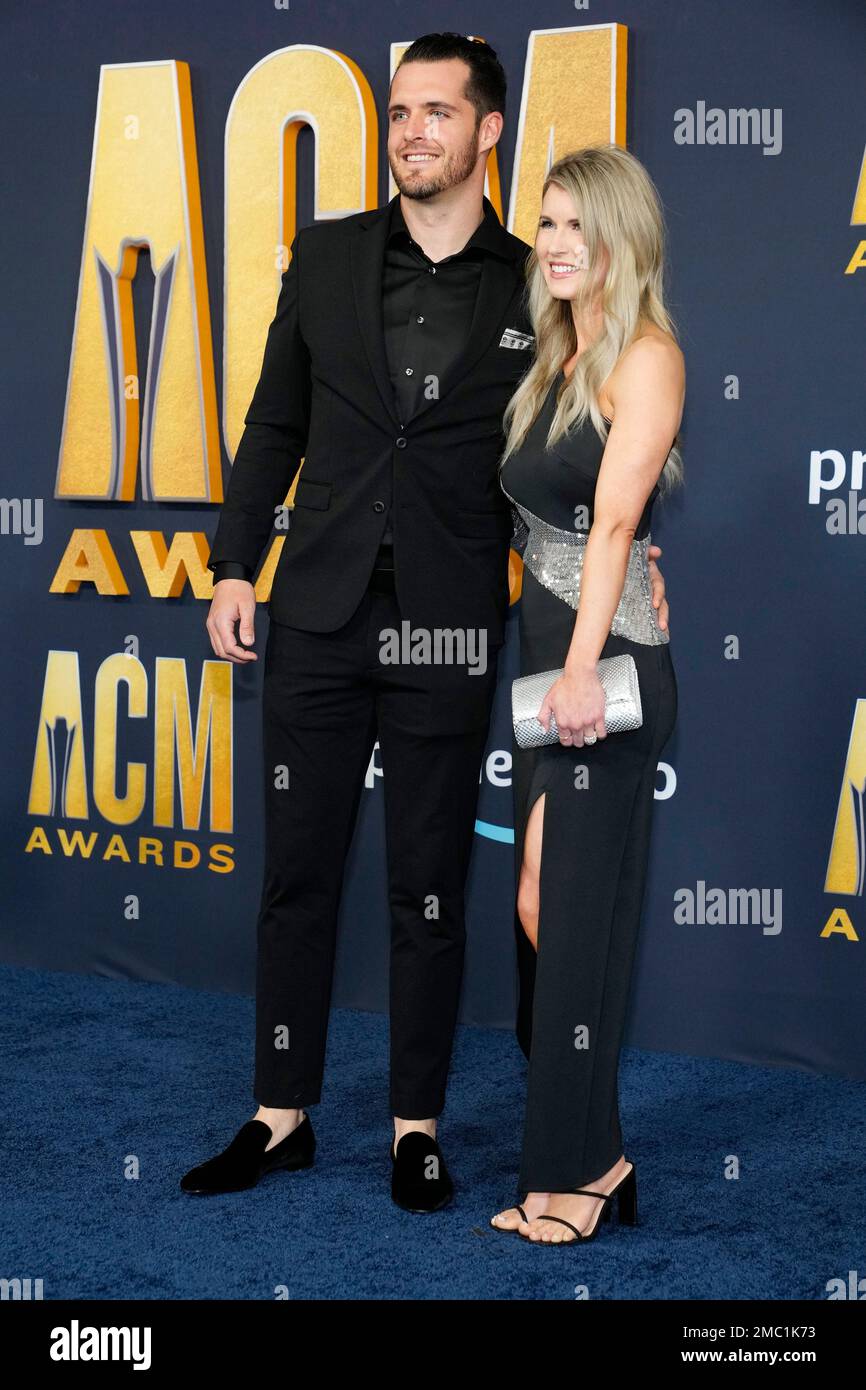 Derek Carr, left, and Heather Neel arrive at the 57th Academy of ...