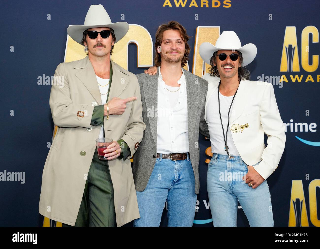 Mark Wystrach, left, and Cameron Duddy, right, of Midland pose with ...