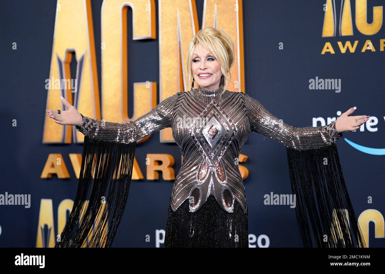 Dolly Parton arrives at the 57th Academy of Country Music Awards on ...