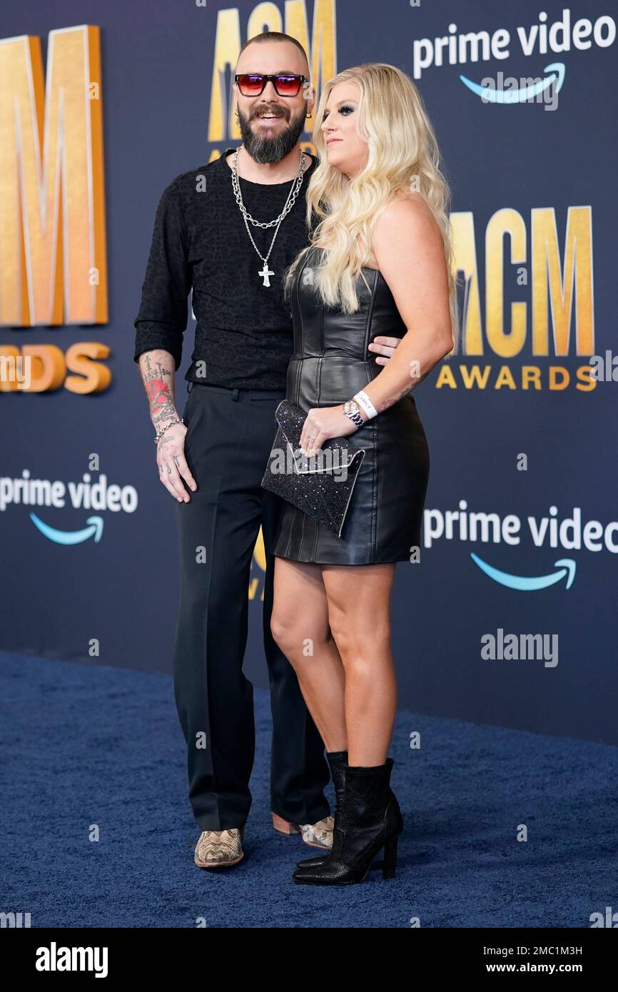 Elvie Shane, left and Mandi Payton arrive at the 57th Academy of ...