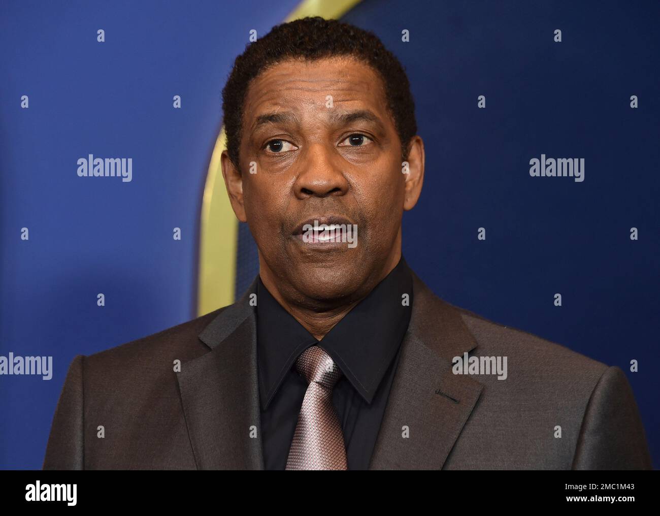 Denzel Washington arrives at the 94th Academy Awards nominees luncheon ...
